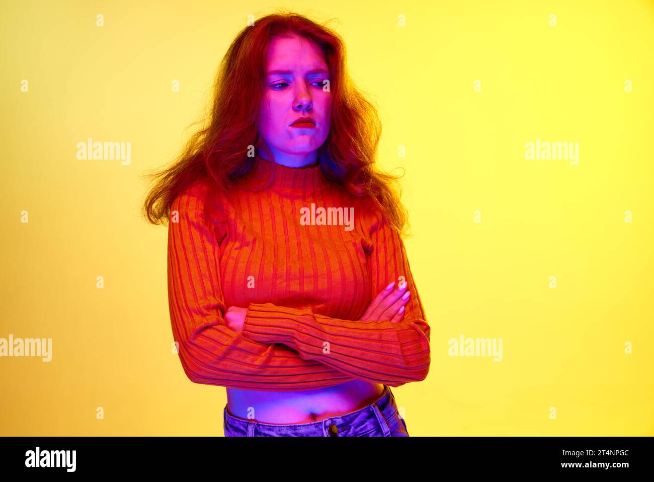 Offended face. Young girl standing with unhappy, unpleasant face ...