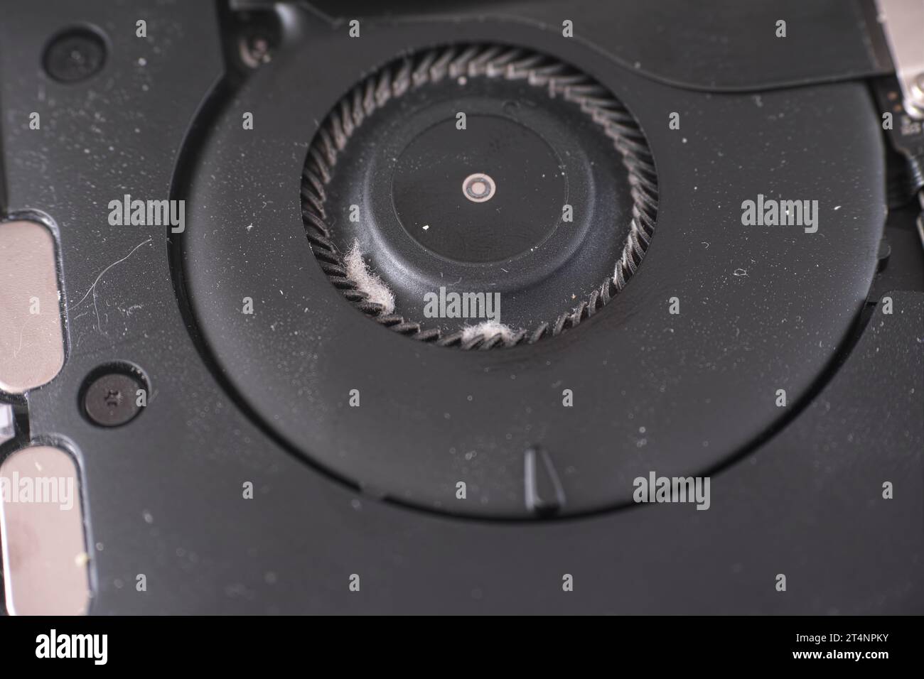 A system board with a laptop fan with dust in it. Close-up Stock Photo ...