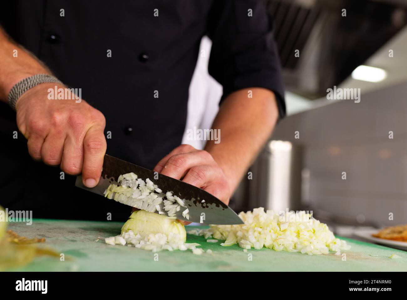 Male chef cutting fresh vegetable hi-res stock photography and images ...