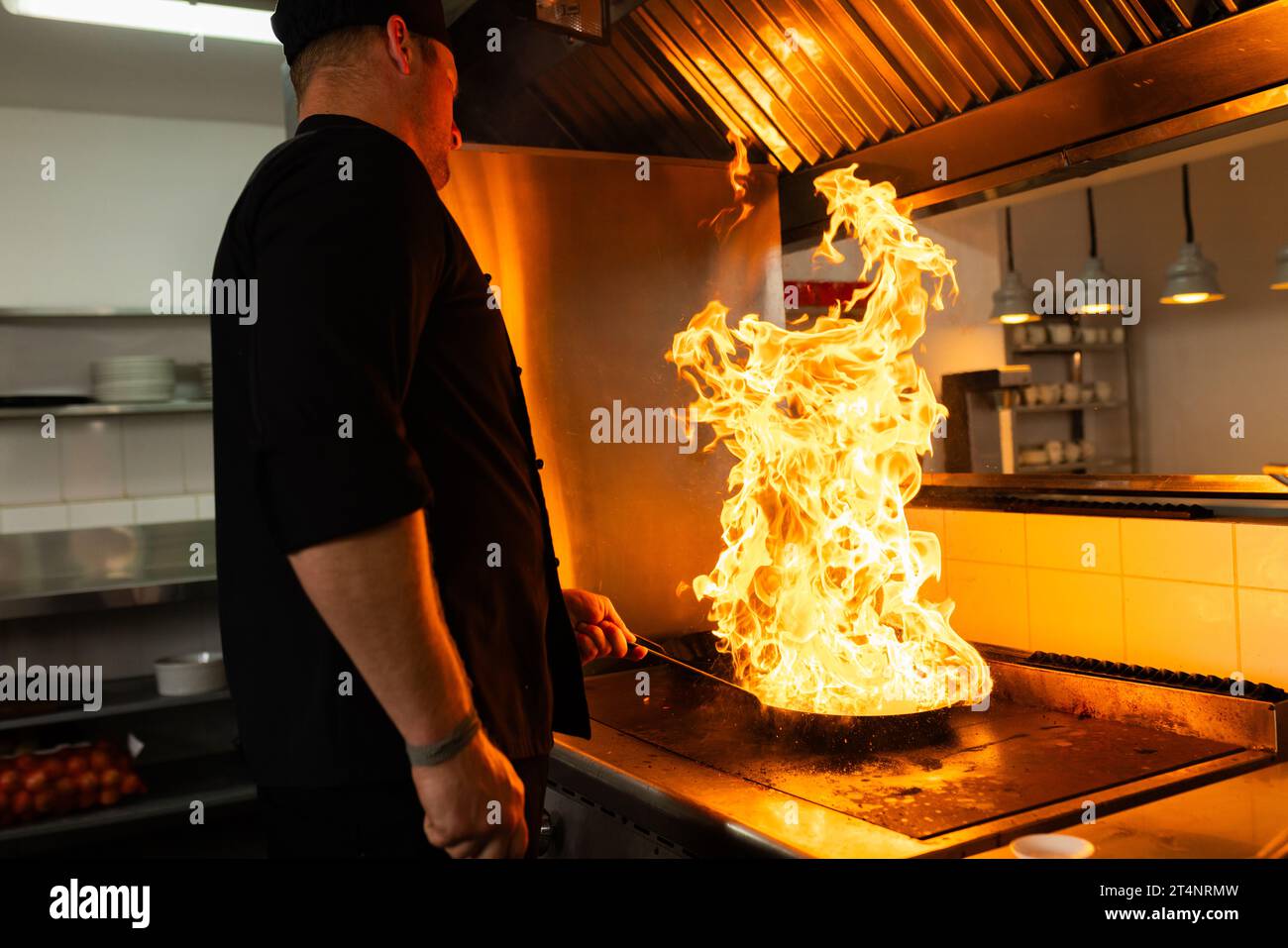 Chef restaurant kitchen flame hi-res stock photography and images - Alamy