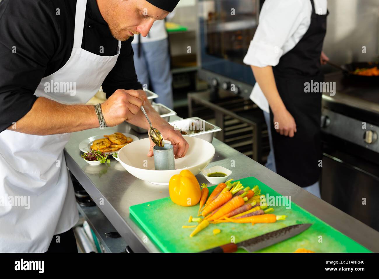 Chef preparing delicious meal in hi-res stock photography and images ...