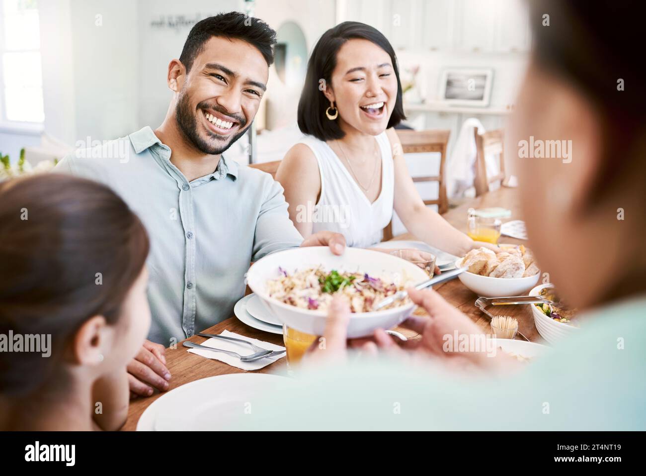 Its about giving. Its about family. a young couple have some lunch with ...