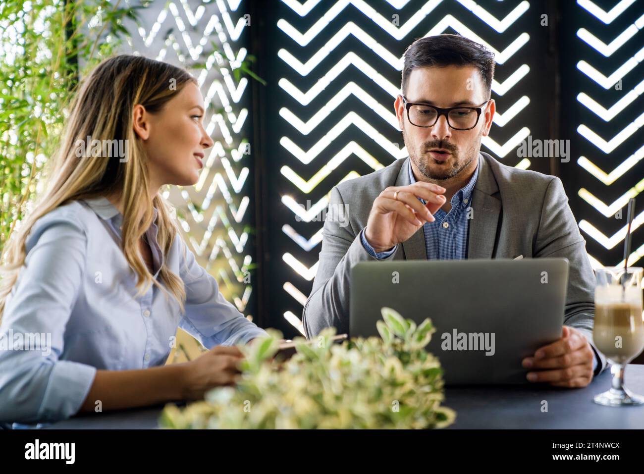 Business people working, having fun and chatting at workplace office ...