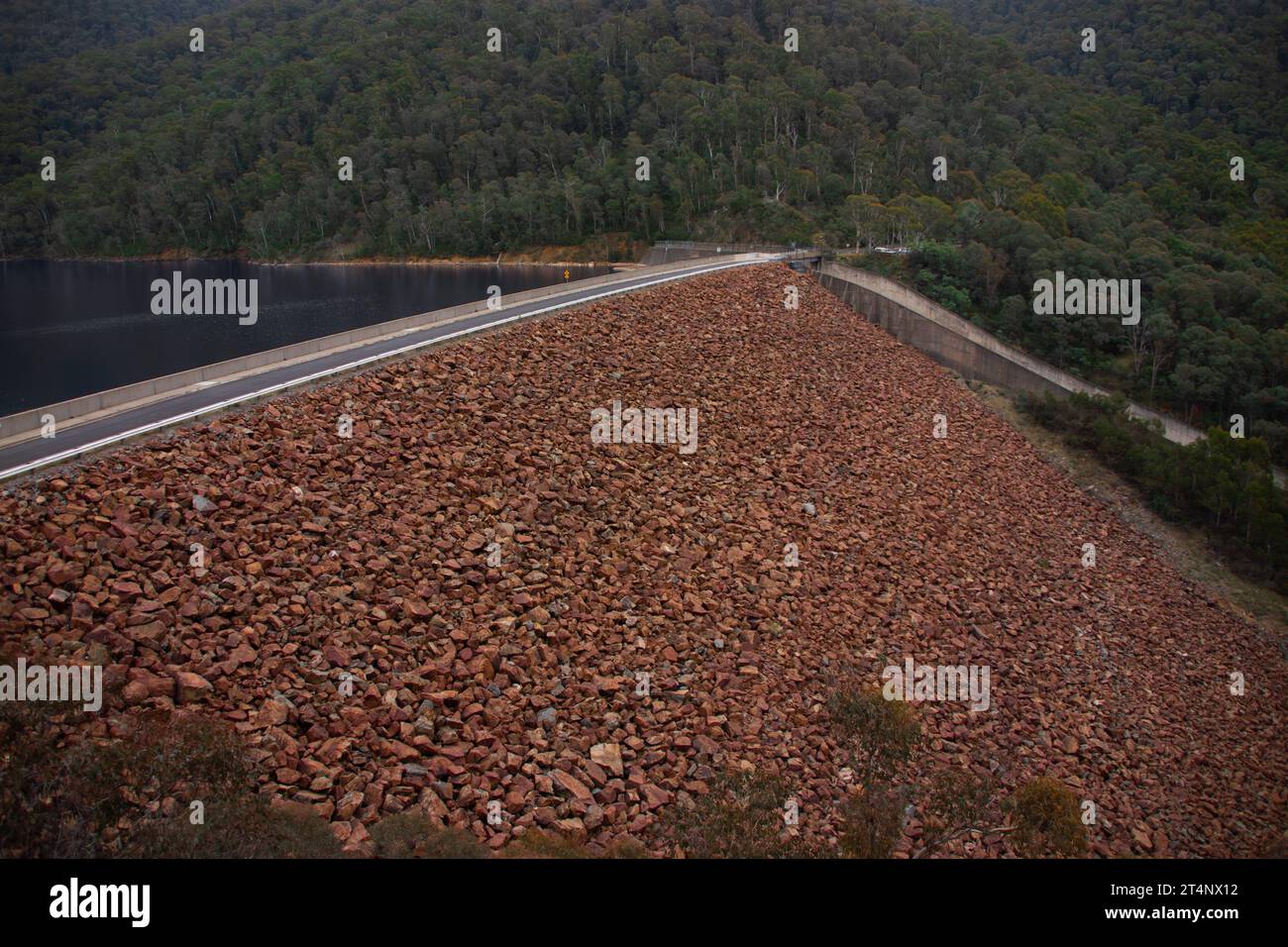 Dam wall made of red rocks, Canberra Stock Photo - Alamy