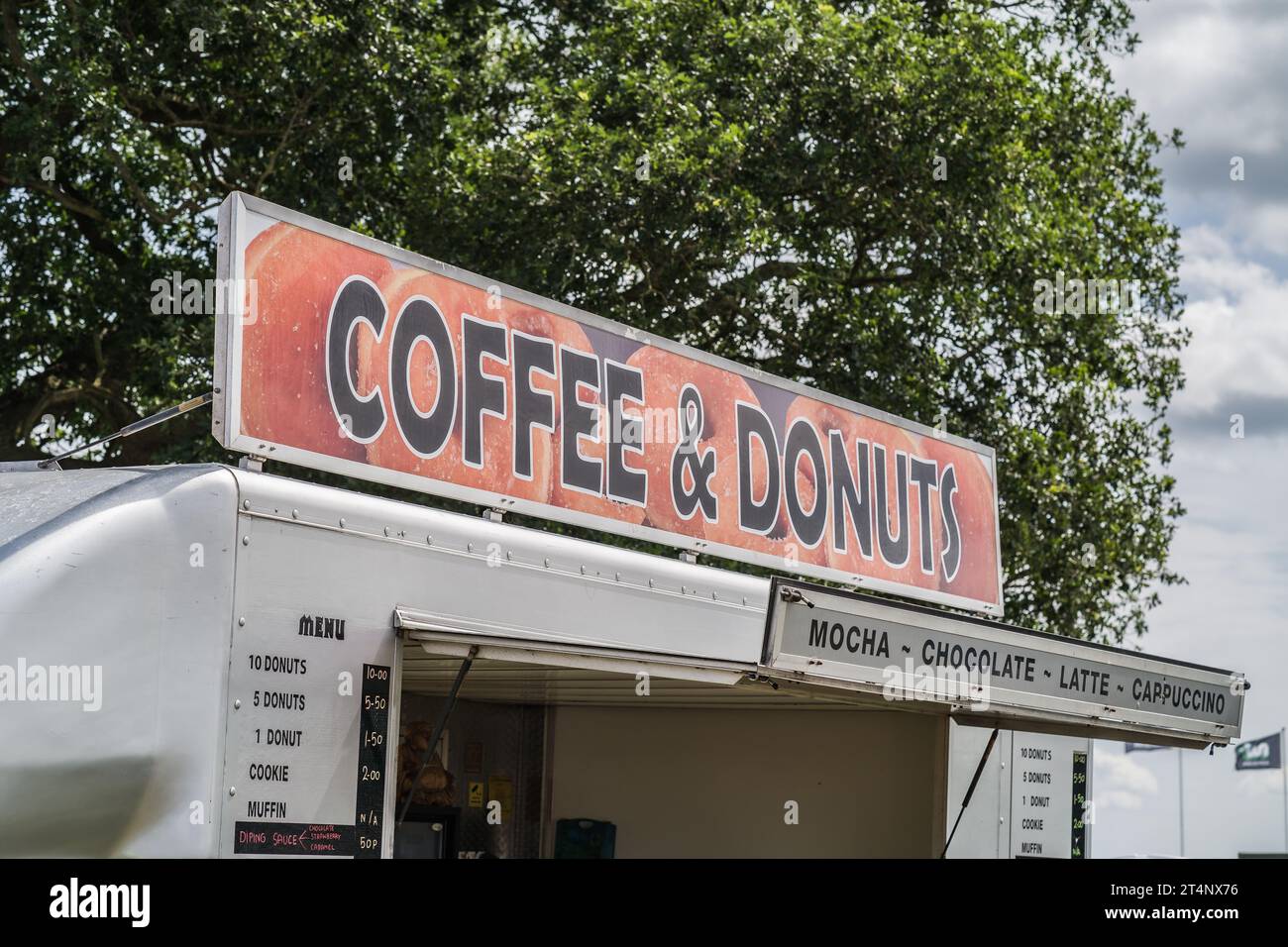 Nantwich, Cheshire, England, July 26th 2023. Coffee and donuts sign ...