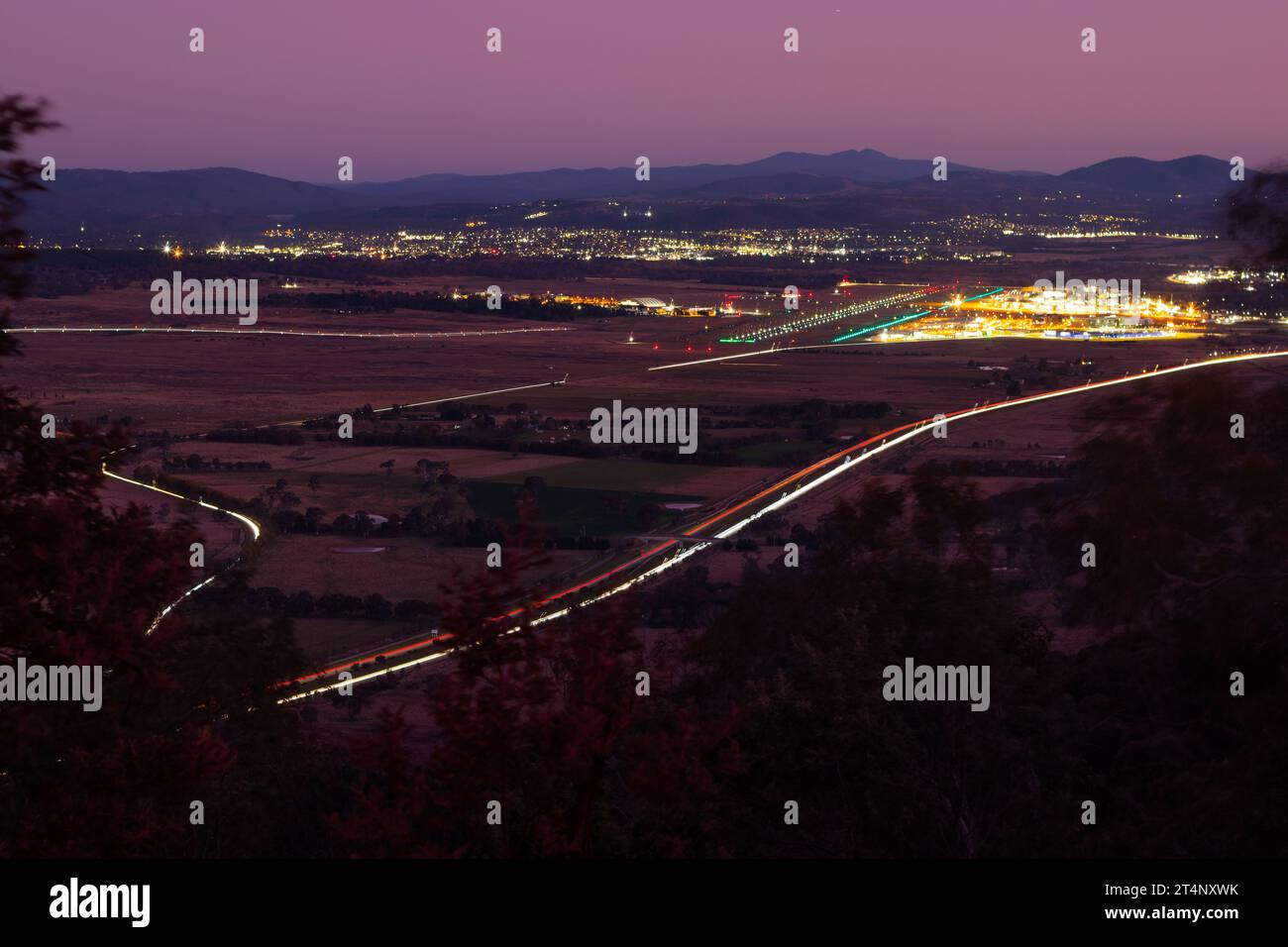 Long exposure of plane taking off from Canberra Airport Stock Photo - Alamy