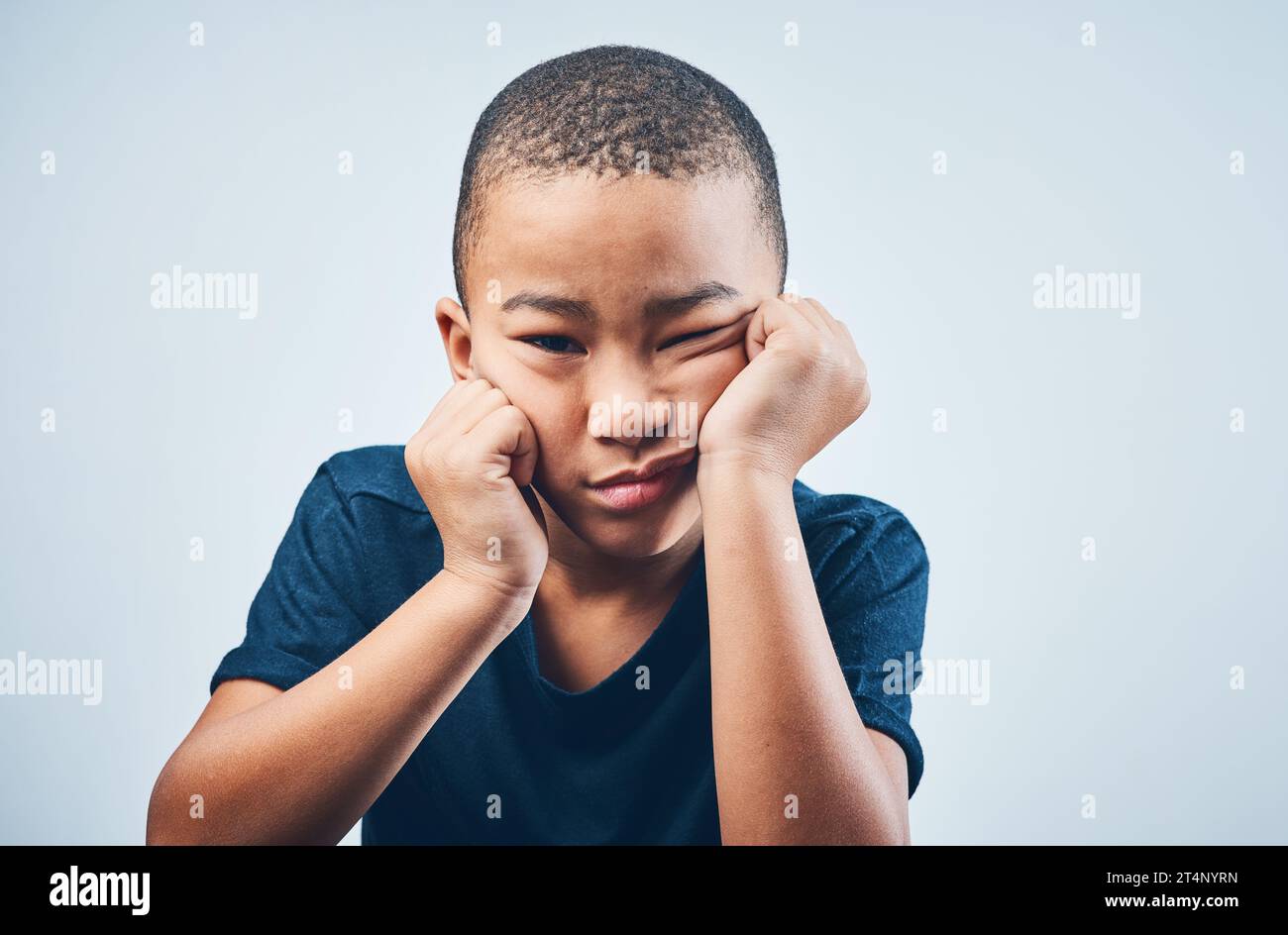 Nobody wants to play with me. Studio shot of a cute little boy looking ...