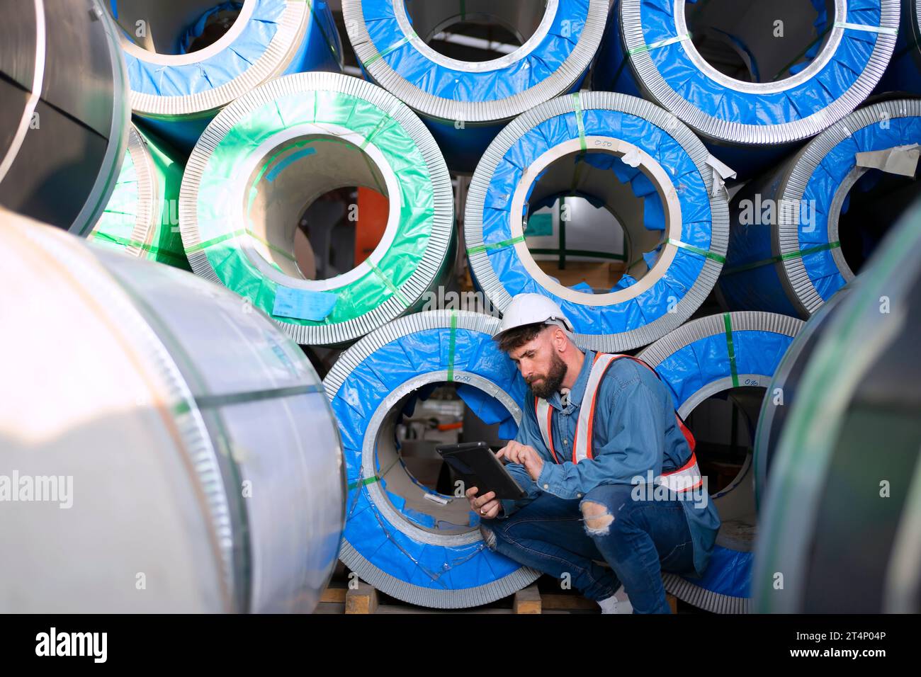 Blue collar worker work at metal sheet factory. Blue collar worker and ...