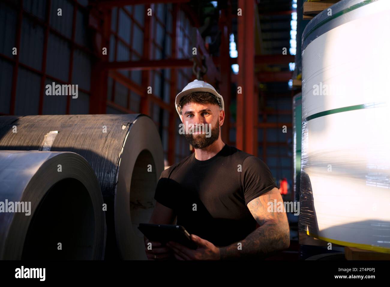 Blue collar worker work at metal sheet factory. Blue collar worker and ...