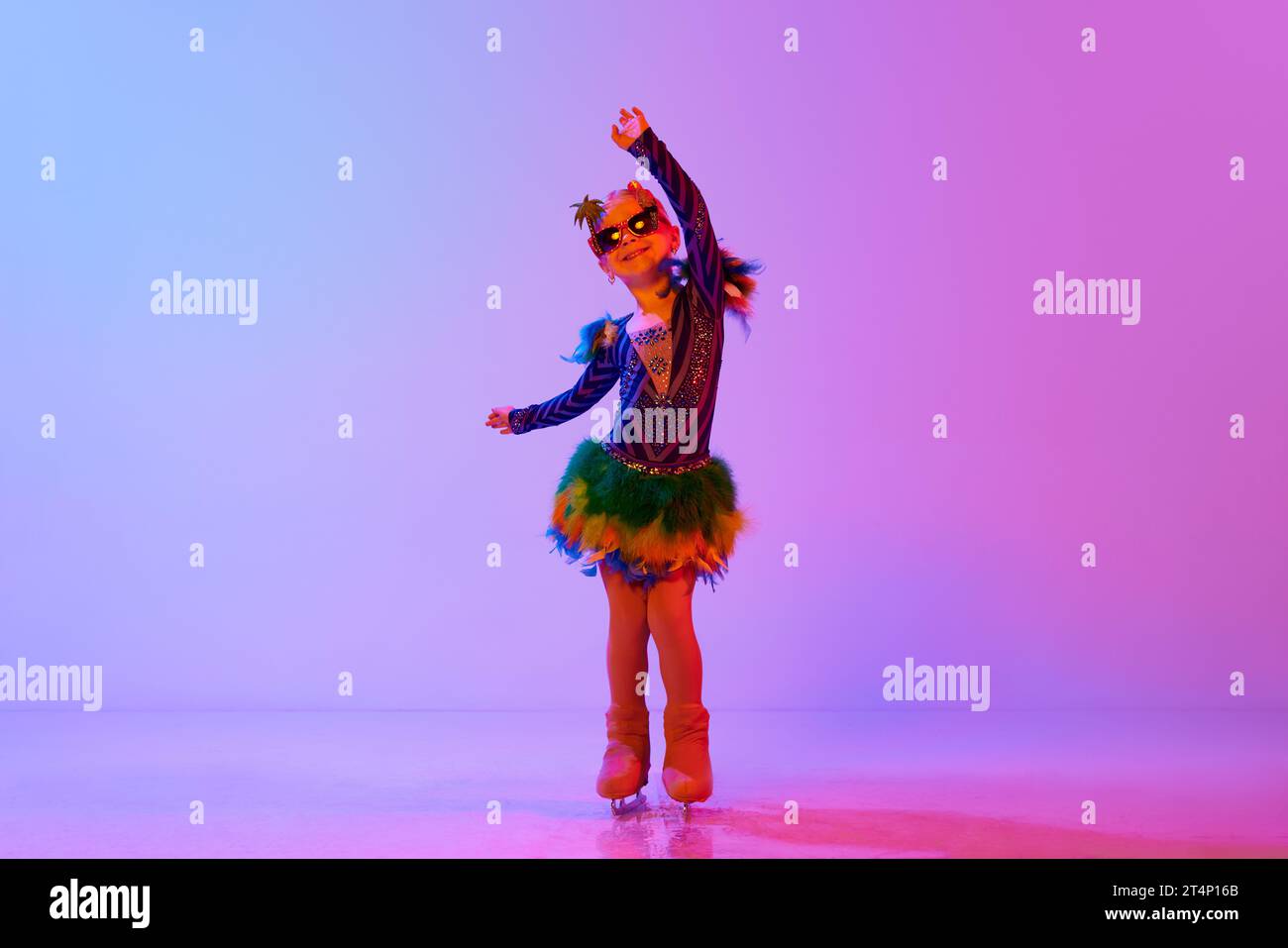 Little girl, talented kid, figure skating athlete in costume dancing ...