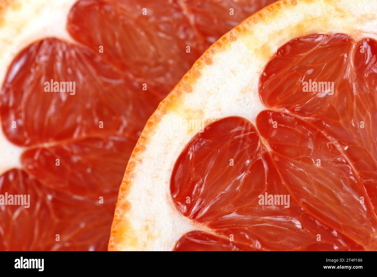 Top view of grapefruit slice, as background. Macro of red grapefruit. fruit citrus grapefruit ...