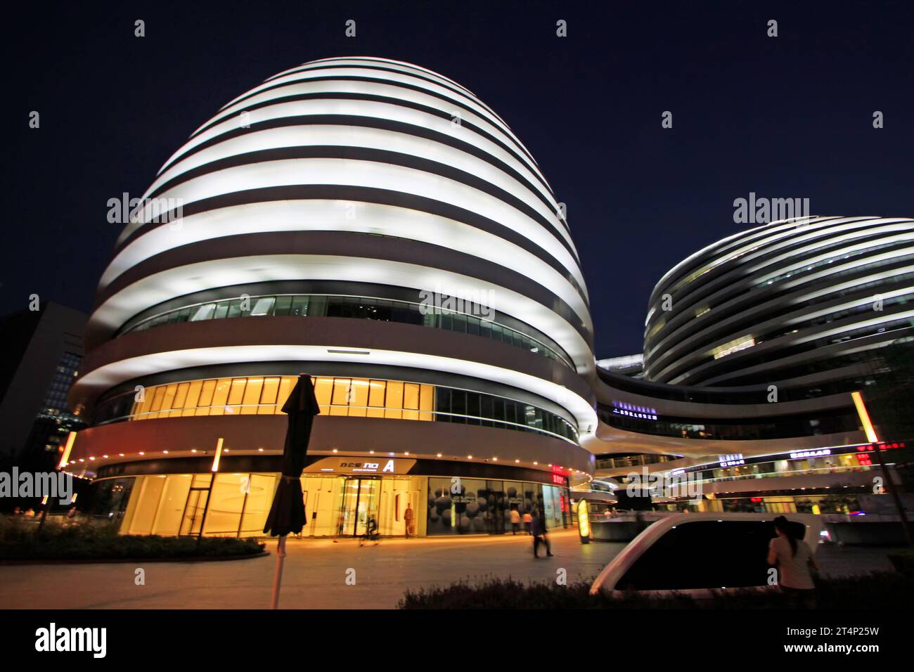 Beijing - September 19: Galaxy SOHO building scene at night, on ...