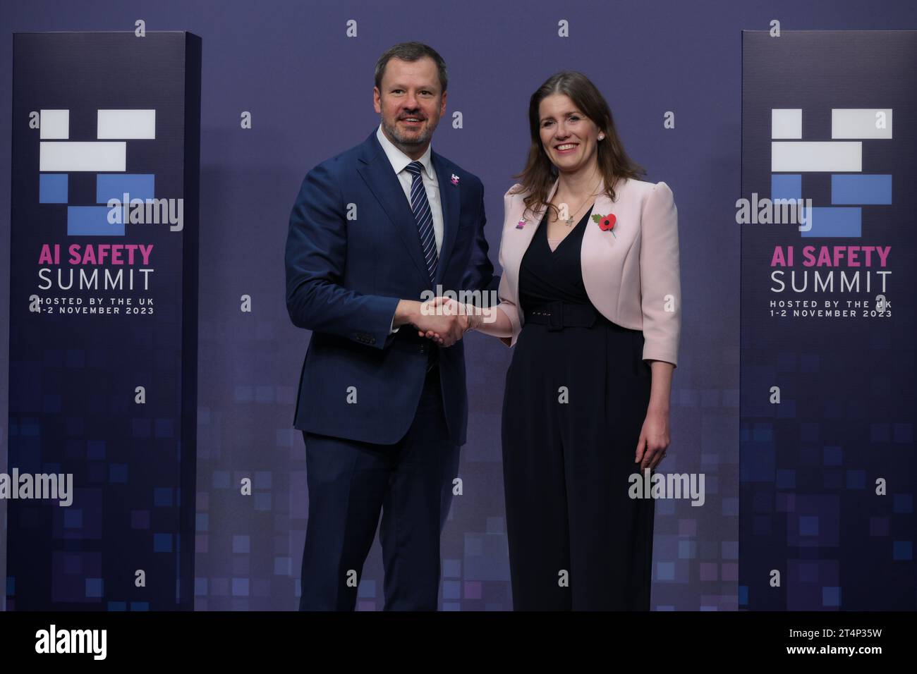Technology Secretary Michelle Donelan greets Ed Husic, Minister for ...