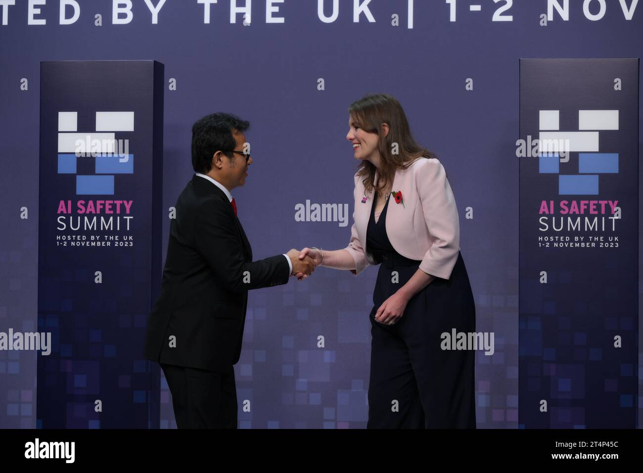 Technology Secretary Michelle Donelan greets Nezar Patria, Deputy ...