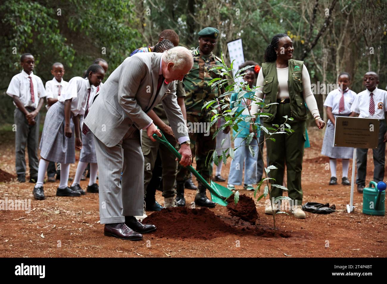 King Charles III plants a tree during a visit to Karura urban forest in ...