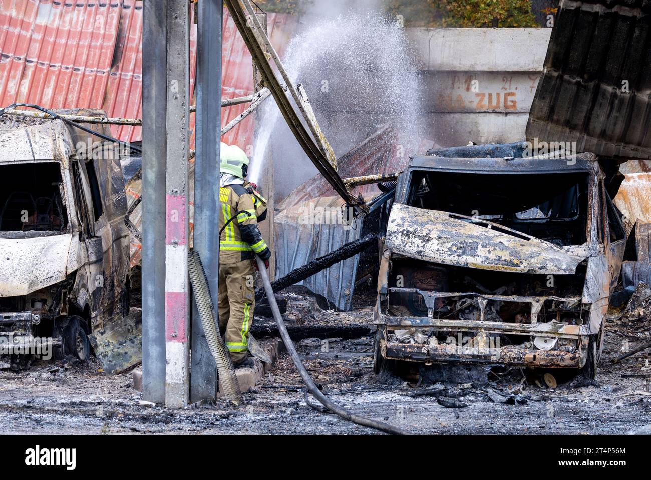 Warin, Germany. 01st Nov, 2023. Firefighters extinguish the last flames ...
