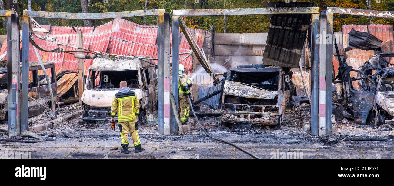 Warin, Germany. 01st Nov, 2023. Firefighters extinguish the last flames ...