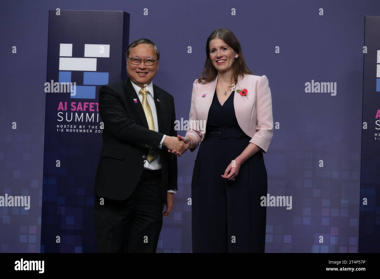 Technology Secretary Michelle Donelan greets Ivan John Uy, Secretary of ...