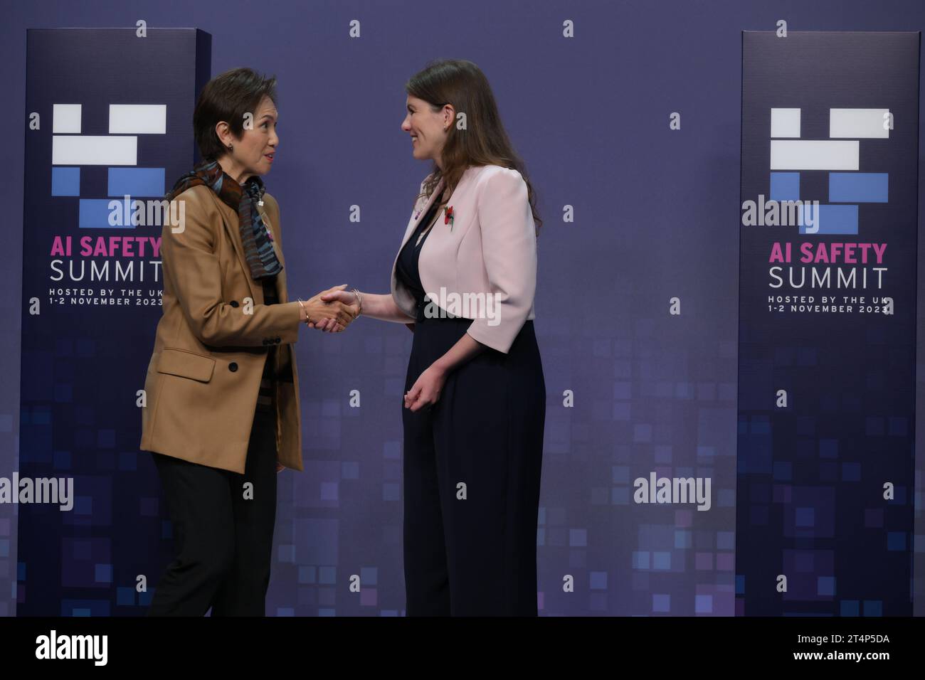 Technology Secretary Michelle Donelan greets Josephine Teo, Minister ...
