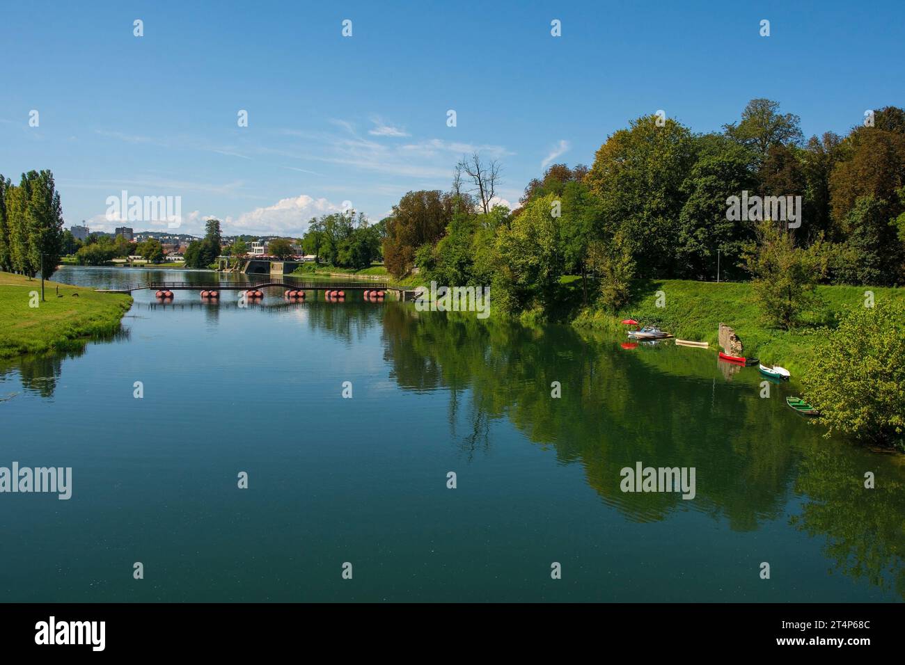 Pjesacki Pontonski Most bridge crosses the Korana River as it passes ...