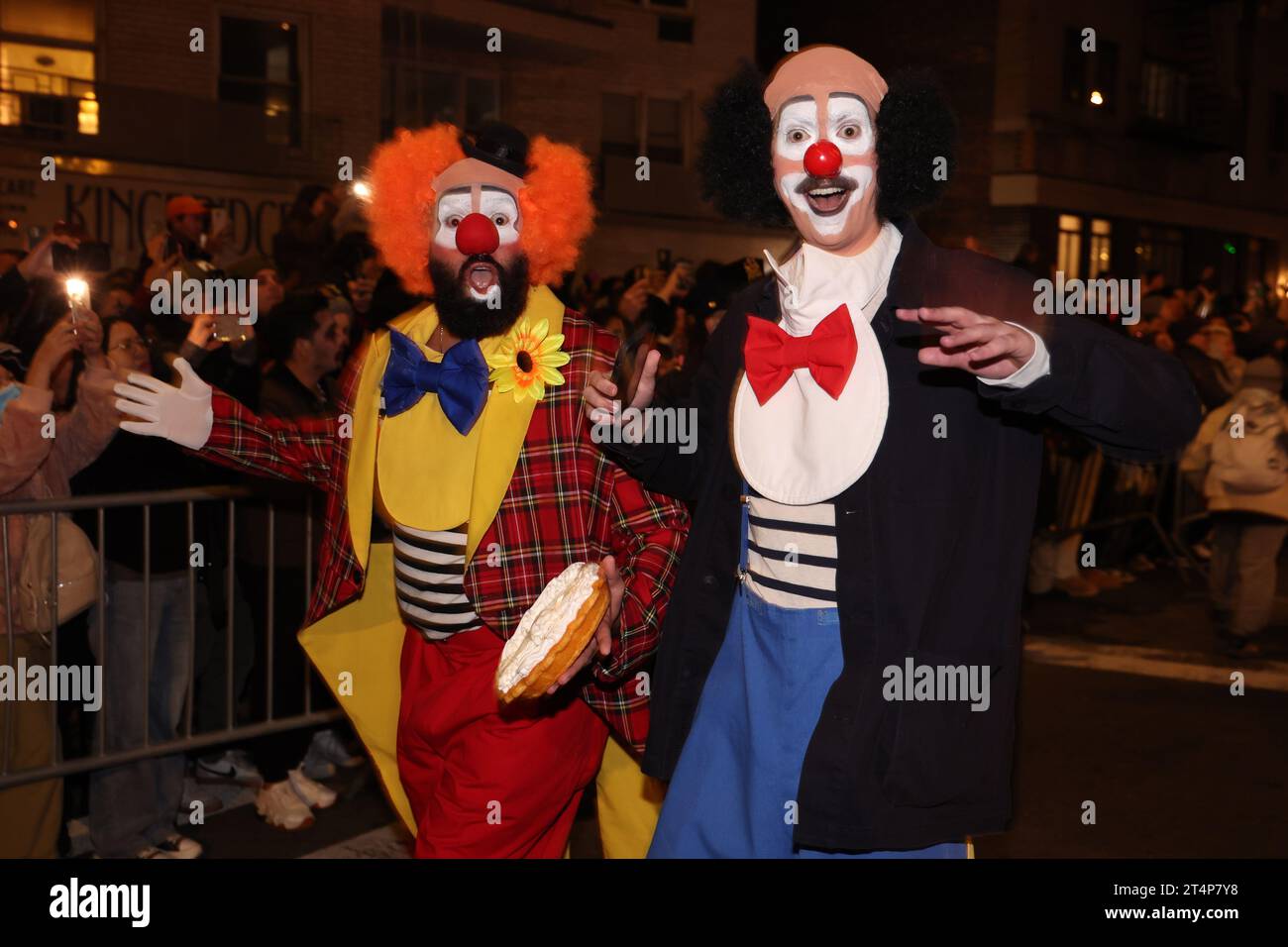 Revelers dressed as happy clowns march during the New York’s 50th ...