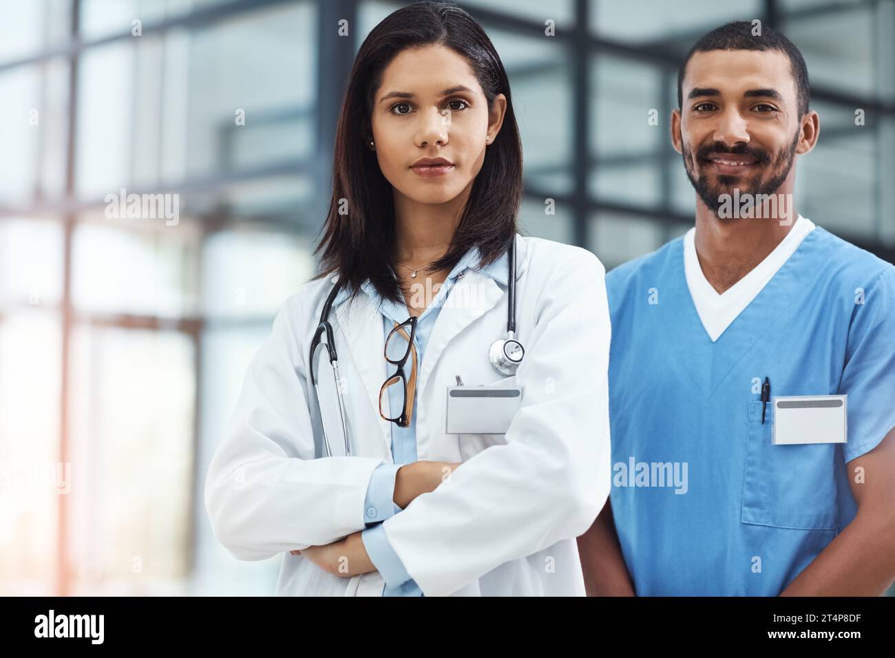 Here to give you the best care possible. Portrait of two confident ...