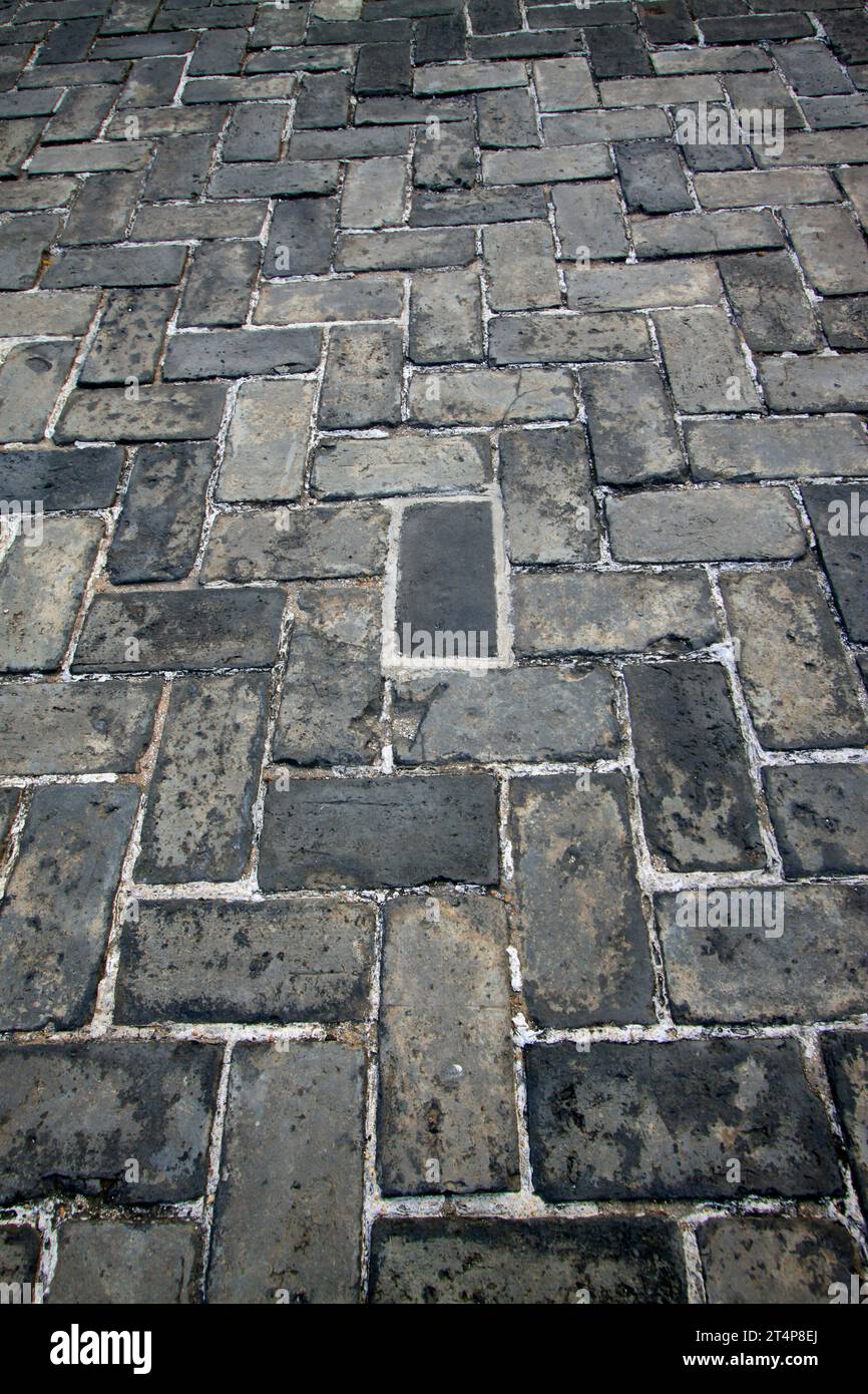 Brick on the ground Stock Photo - Alamy