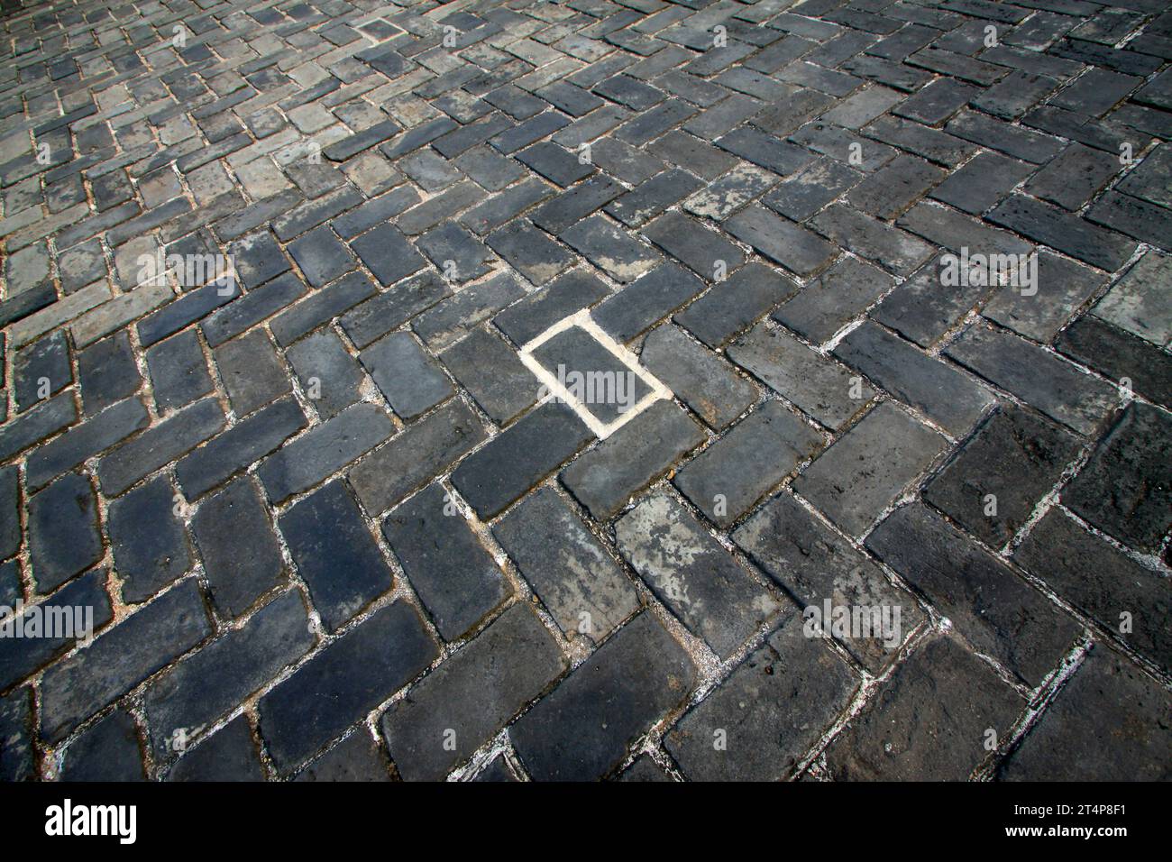 Brick on the ground Stock Photo - Alamy