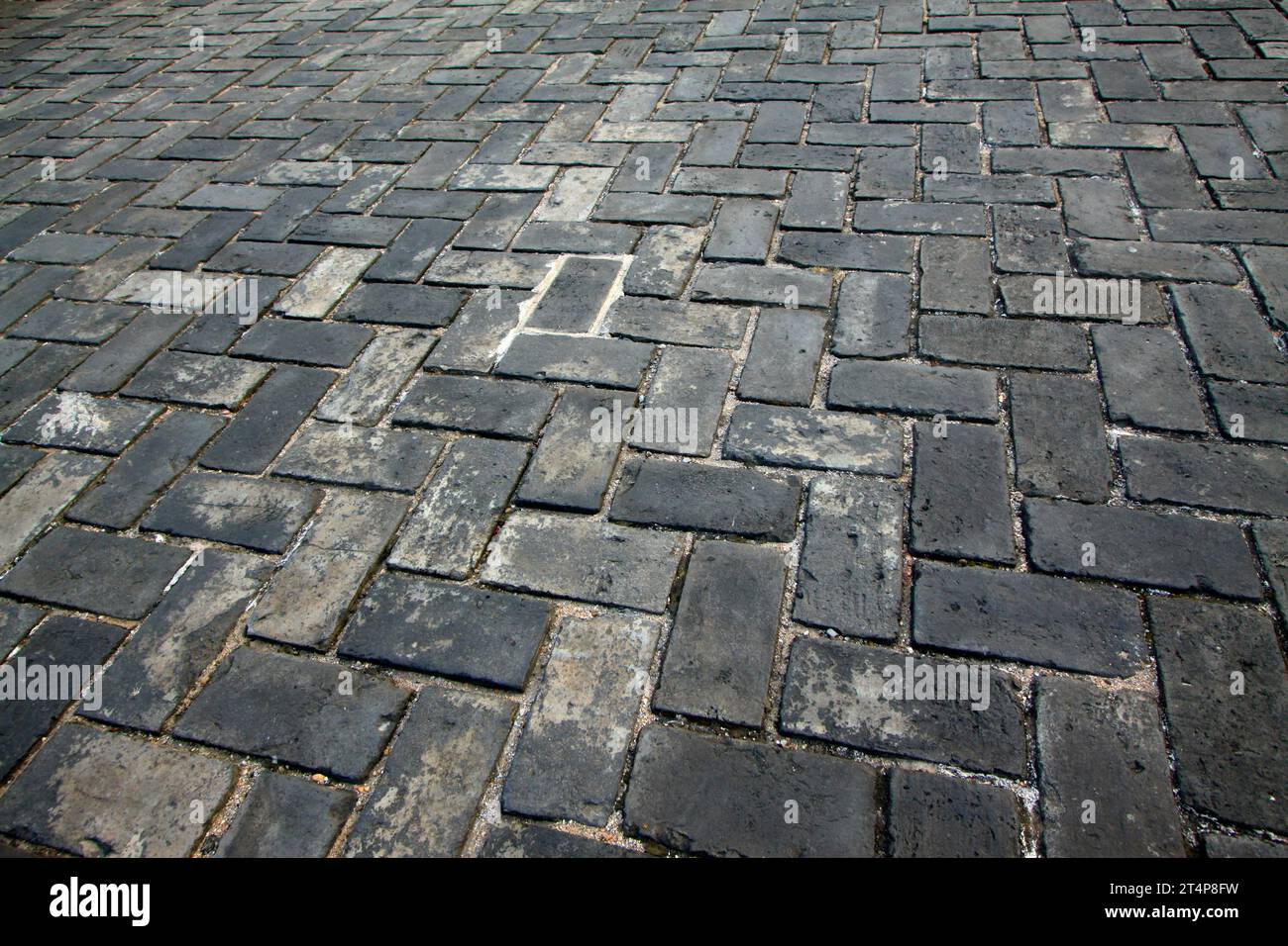 Brick on the ground Stock Photo - Alamy