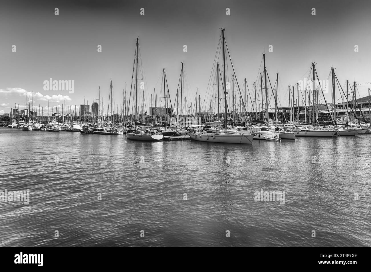 Sailboats and ships docked in the scenic Port Vell, one of the main ...