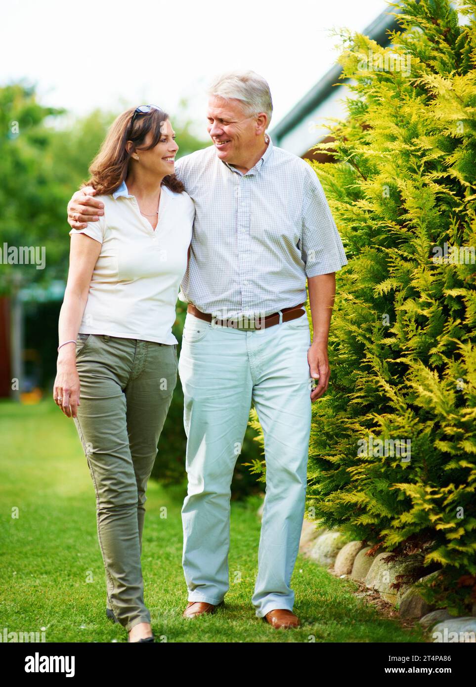 Mature, garden or happy couple hug in backyard or nature on a outdoor romantic walk for support ...
