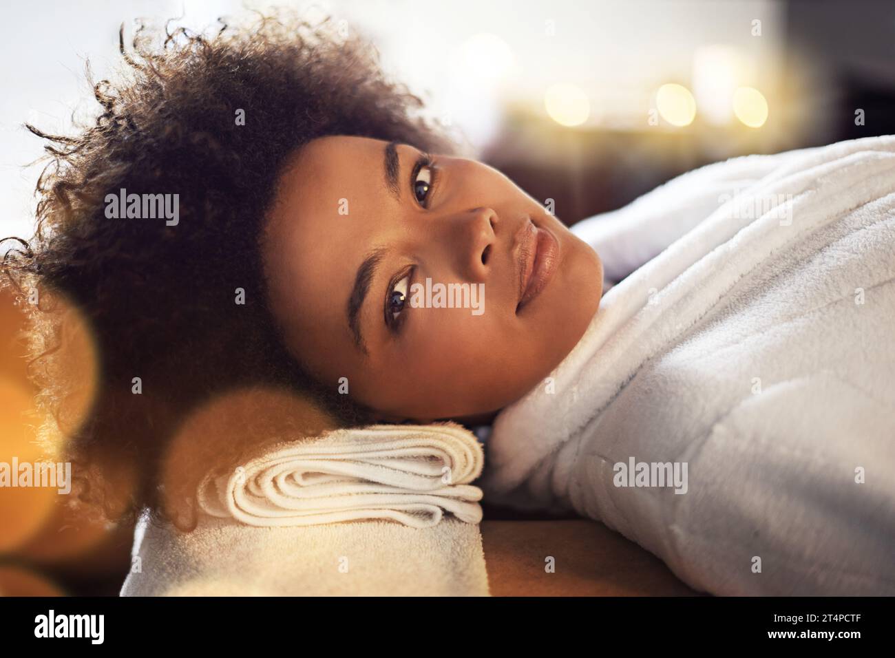 Feeling restored, relaxed and totally at peace. a beautiful young woman ...