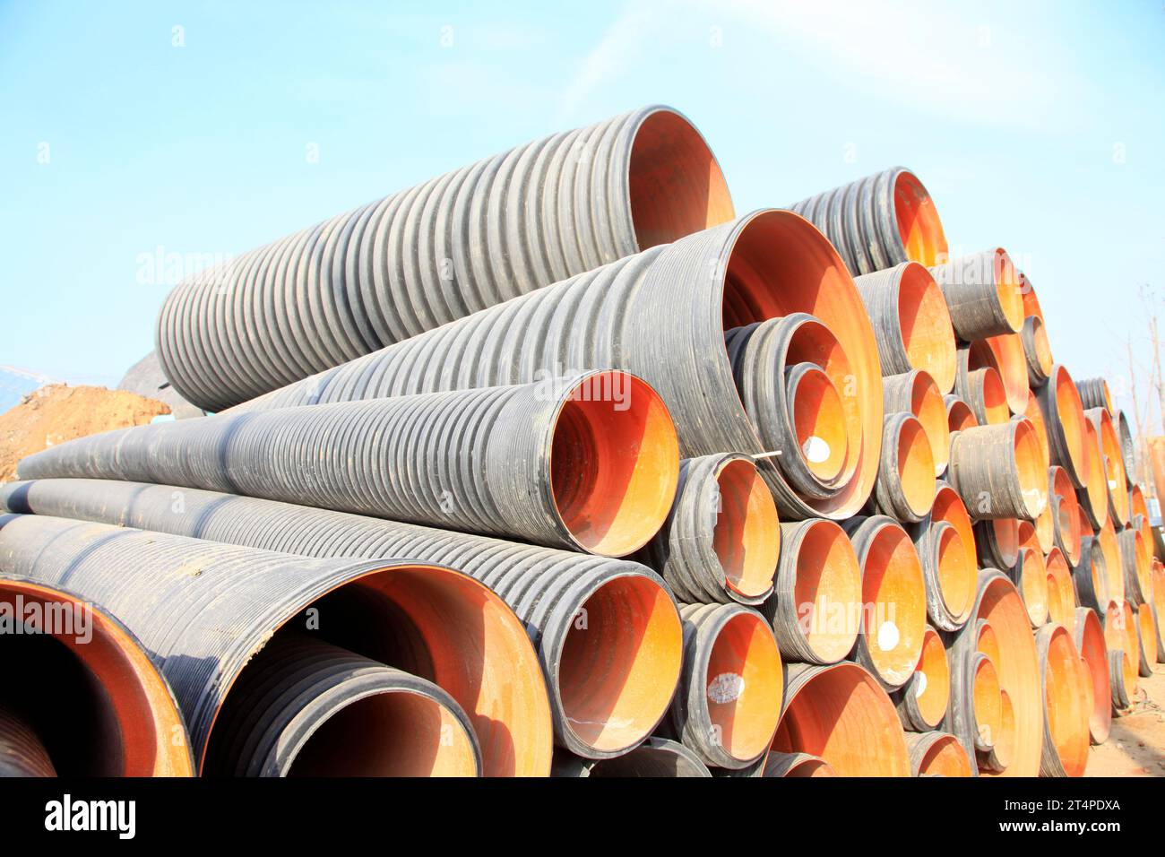 Plastic pipe pile up hi-res stock photography and images - Alamy