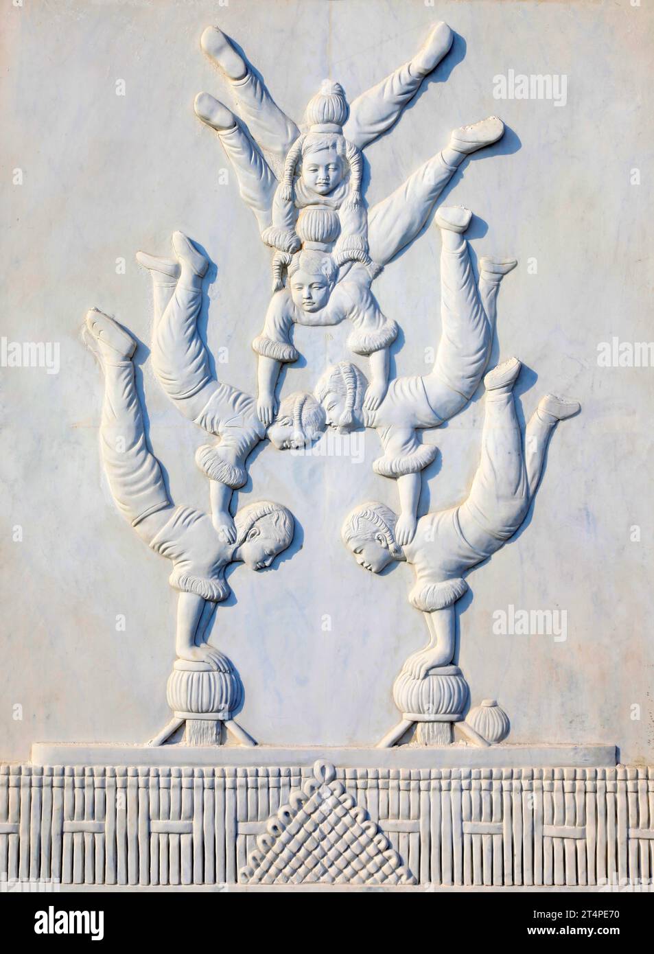 Acrobatic plaster sculpture Stock Photo - Alamy