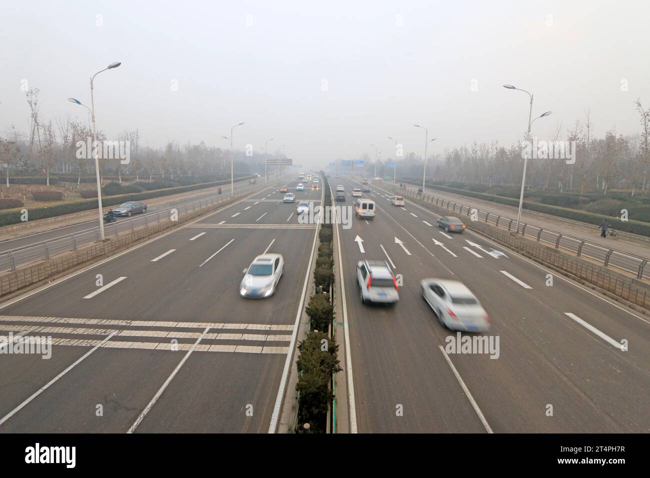 cars running fast on the road Stock Photo - Alamy
