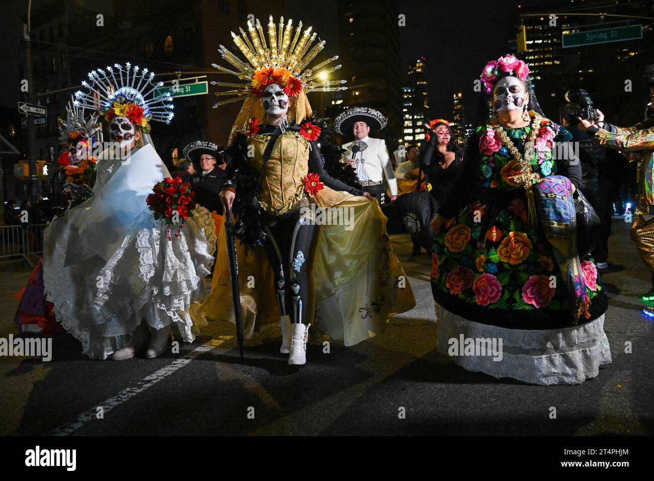 Participants march in the 50th annual Village Halloween Parade on ...