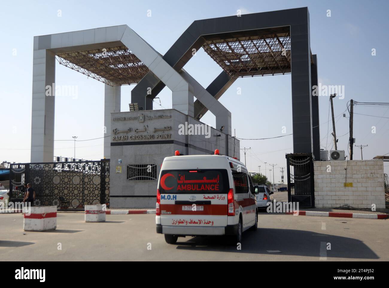A Palestinian health ministry ambulance crrying wounded crosses the ...