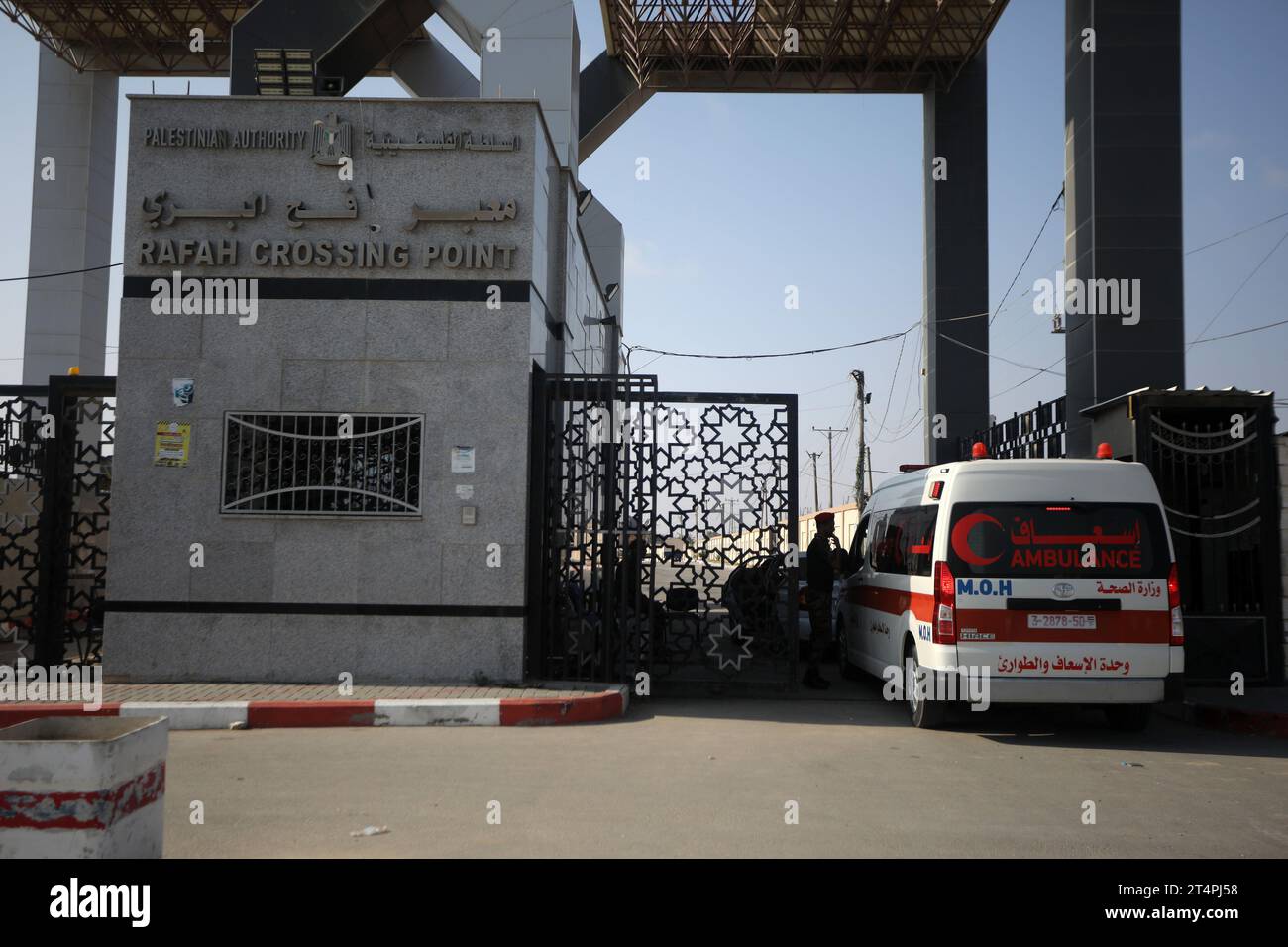 A Palestinian health ministry ambulance crrying wounded crosses the ...