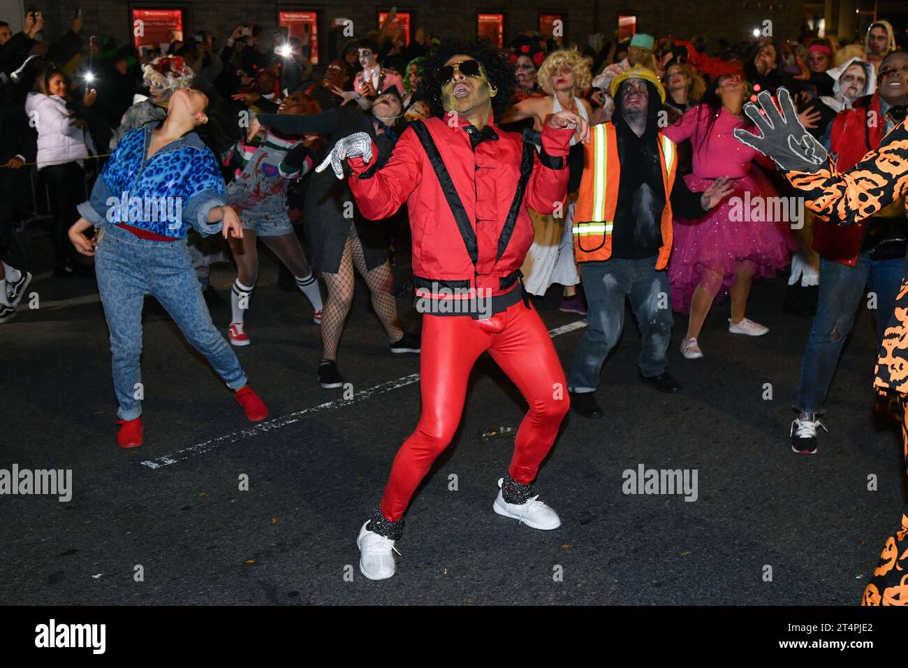 Participants march in the 50th annual Village Halloween Parade on ...