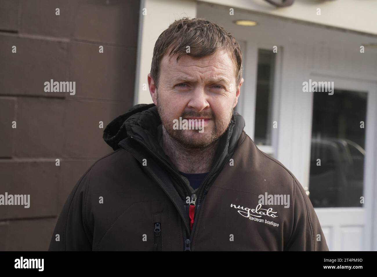 Michael Nugent, the owner of Nugelato ice cream, starts the clean up in ...
