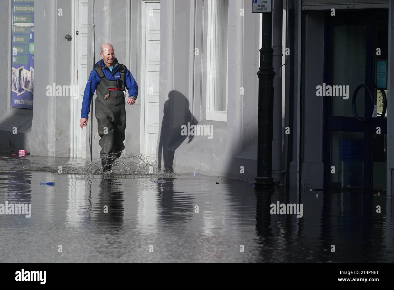 People clear out damaged shops in Sugar Island, Newry Town, Co Down ...