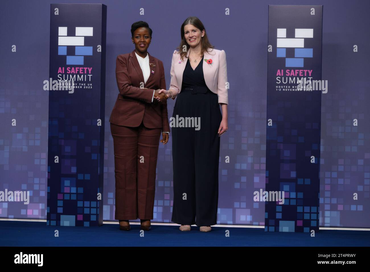 Technology Secretary Michelle Donelan greets Paula Ingabire, Minister ...