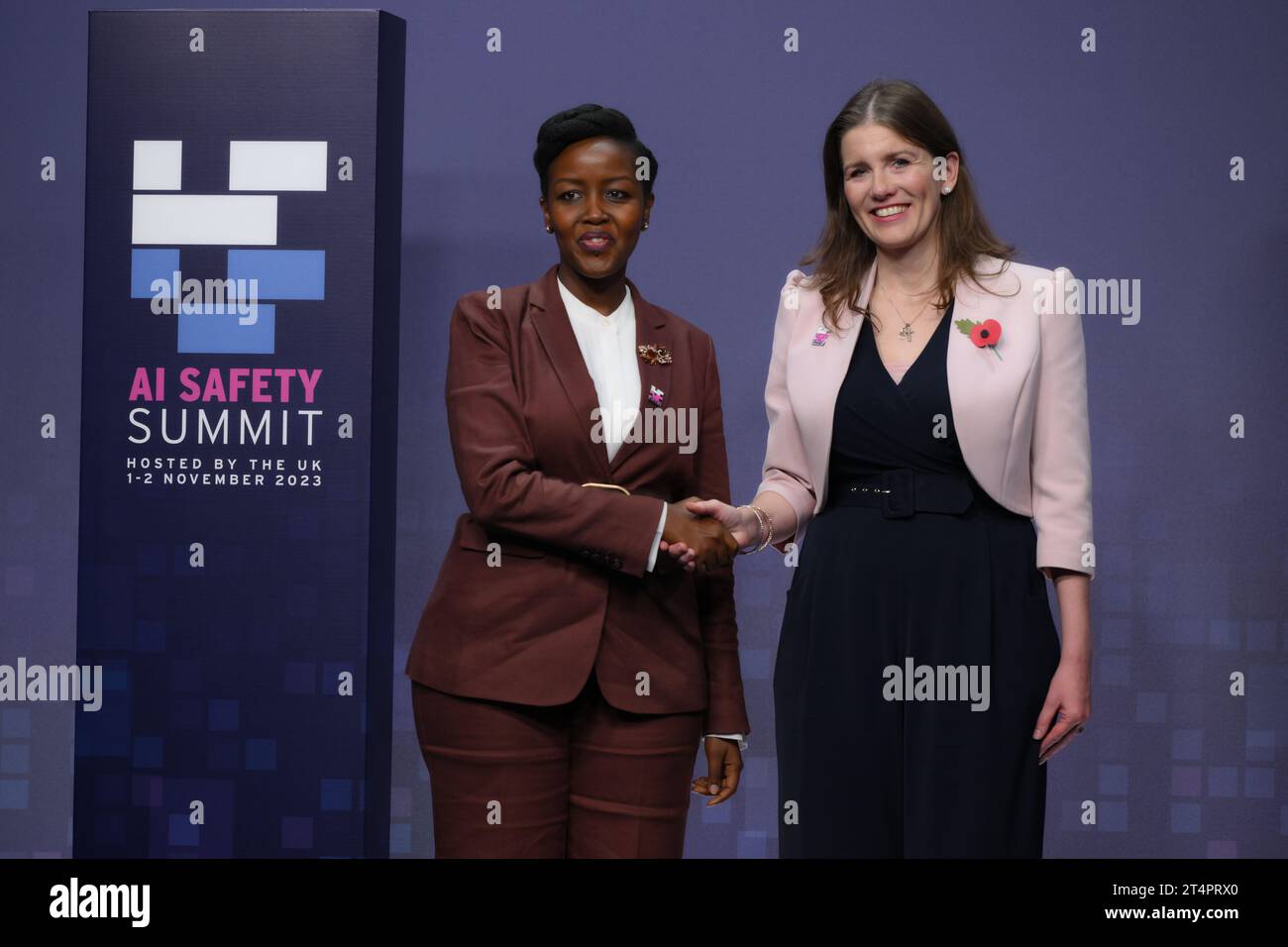 Technology Secretary Michelle Donelan greets Paula Ingabire, Minister ...