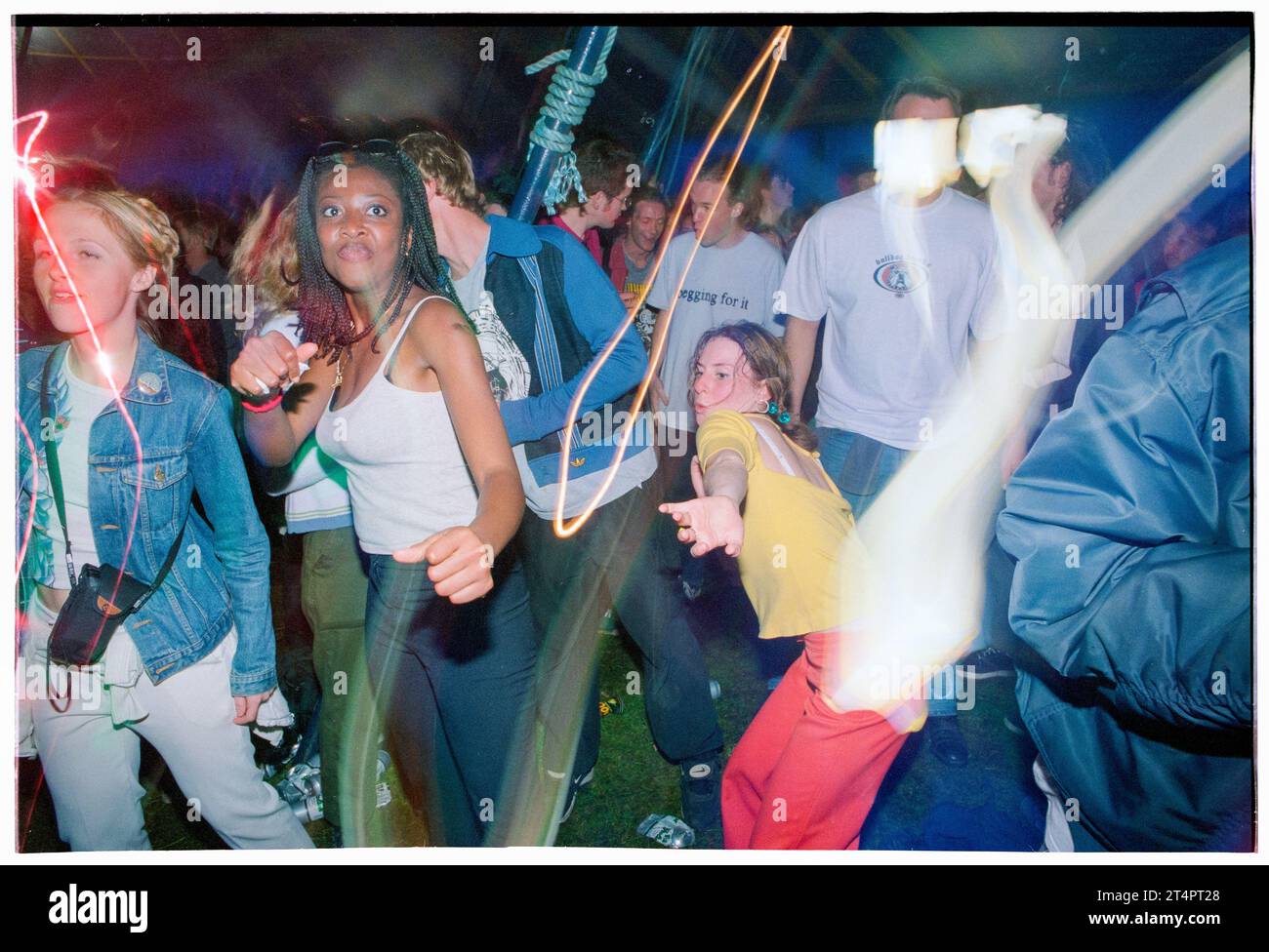 DANCE FANS, ESSENTIAL FESTIVAL, BRIGHTON, 1996: Young dance music fans in the crowd up against ...