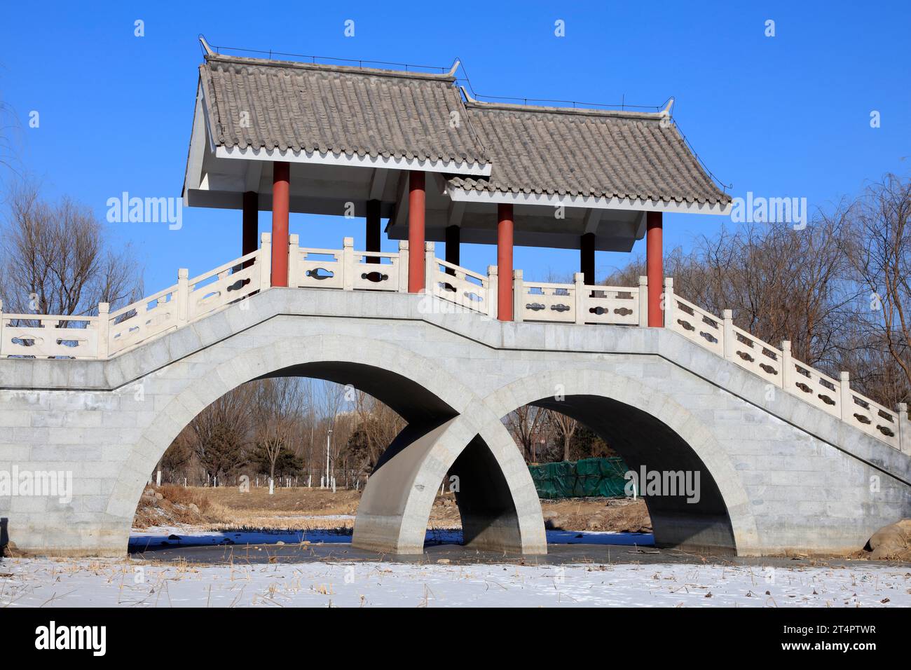 double arch stone bridge in a park, china Stock Photo - Alamy