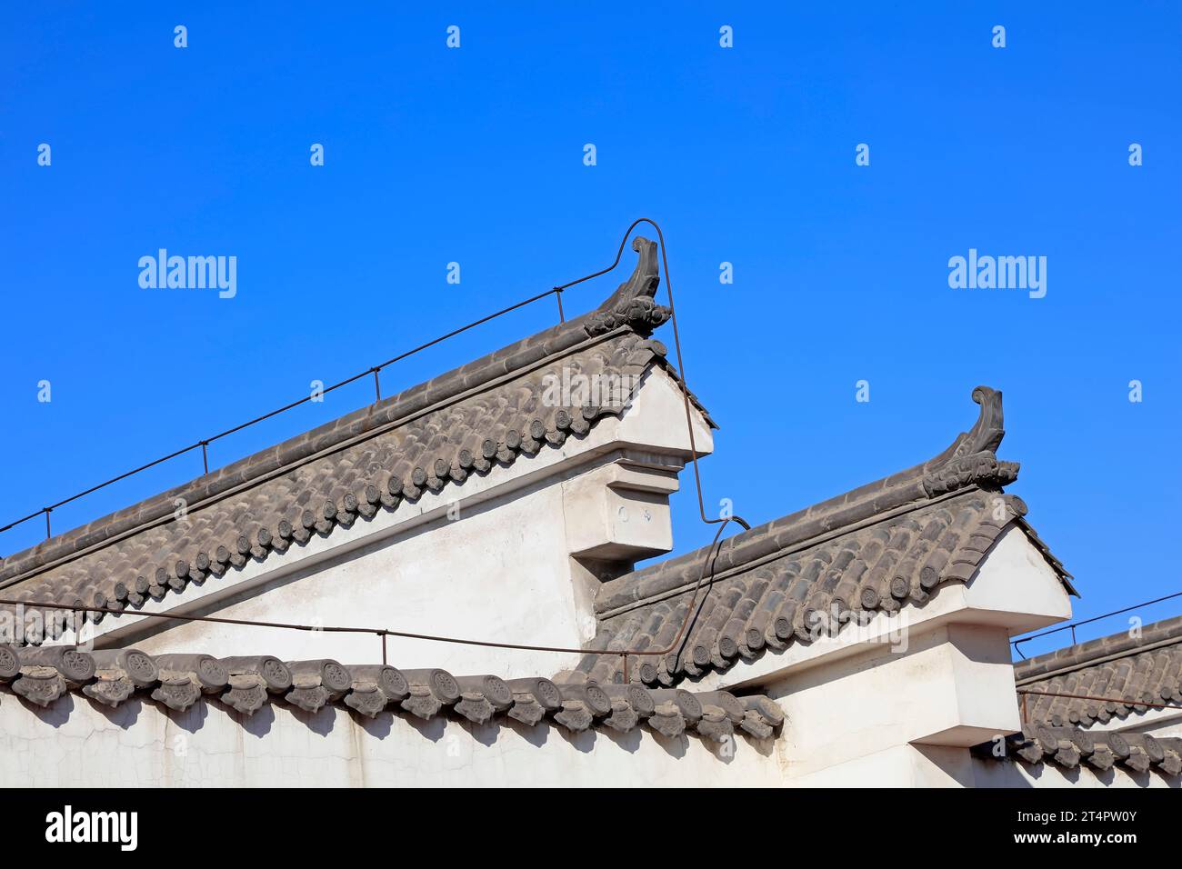 gray tiles and white Hui style architecture Stock Photo - Alamy