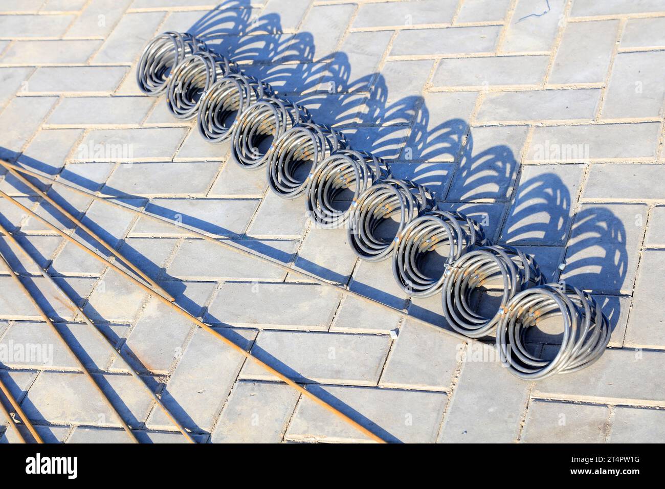 Metal rings on the floor tile Stock Photo - Alamy