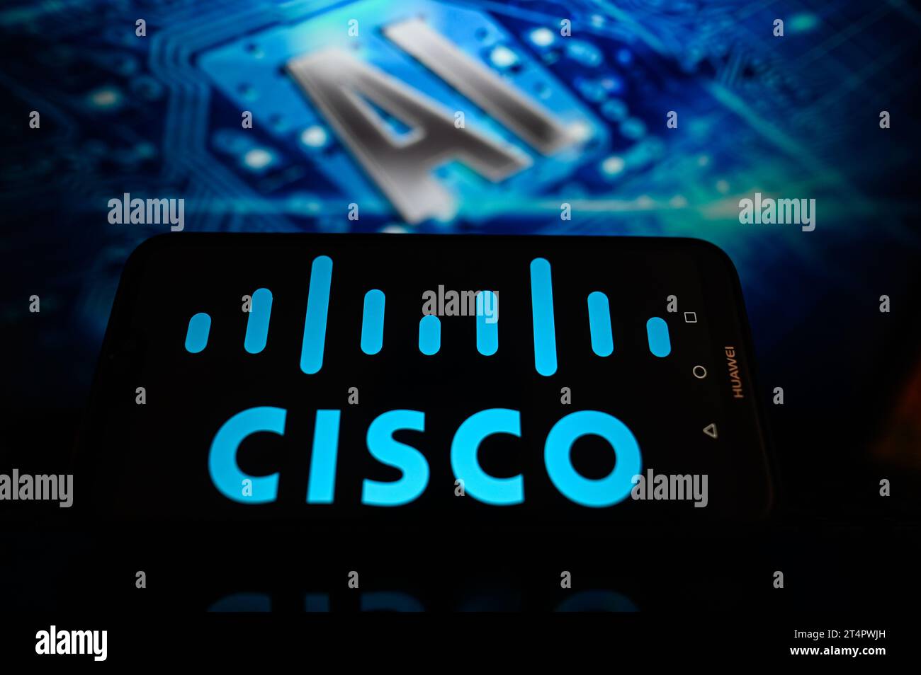 In this photo illustration, a Cisco logo is displayed on a smartphone ...