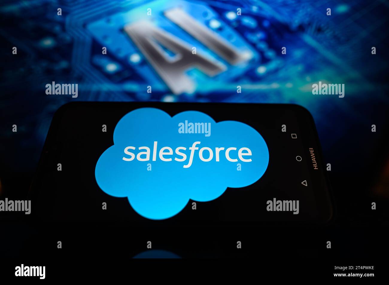 In this photo illustration, a Sales Force logo is displayed on a ...