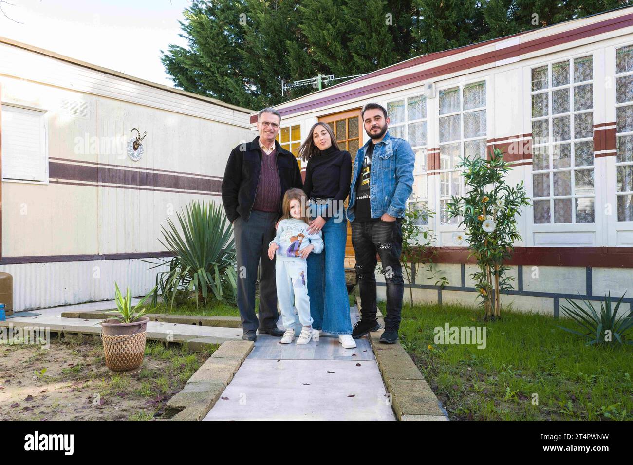 Photo of the Duko family with father, son and his wife and daughter, in ...